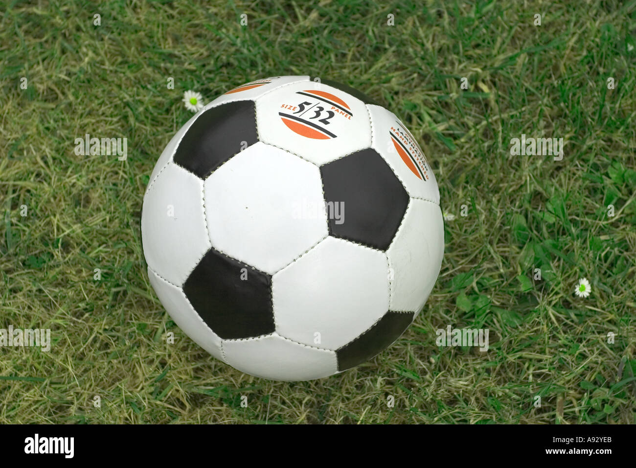 soccer ball on gree grass Stock Photo - Alamy
