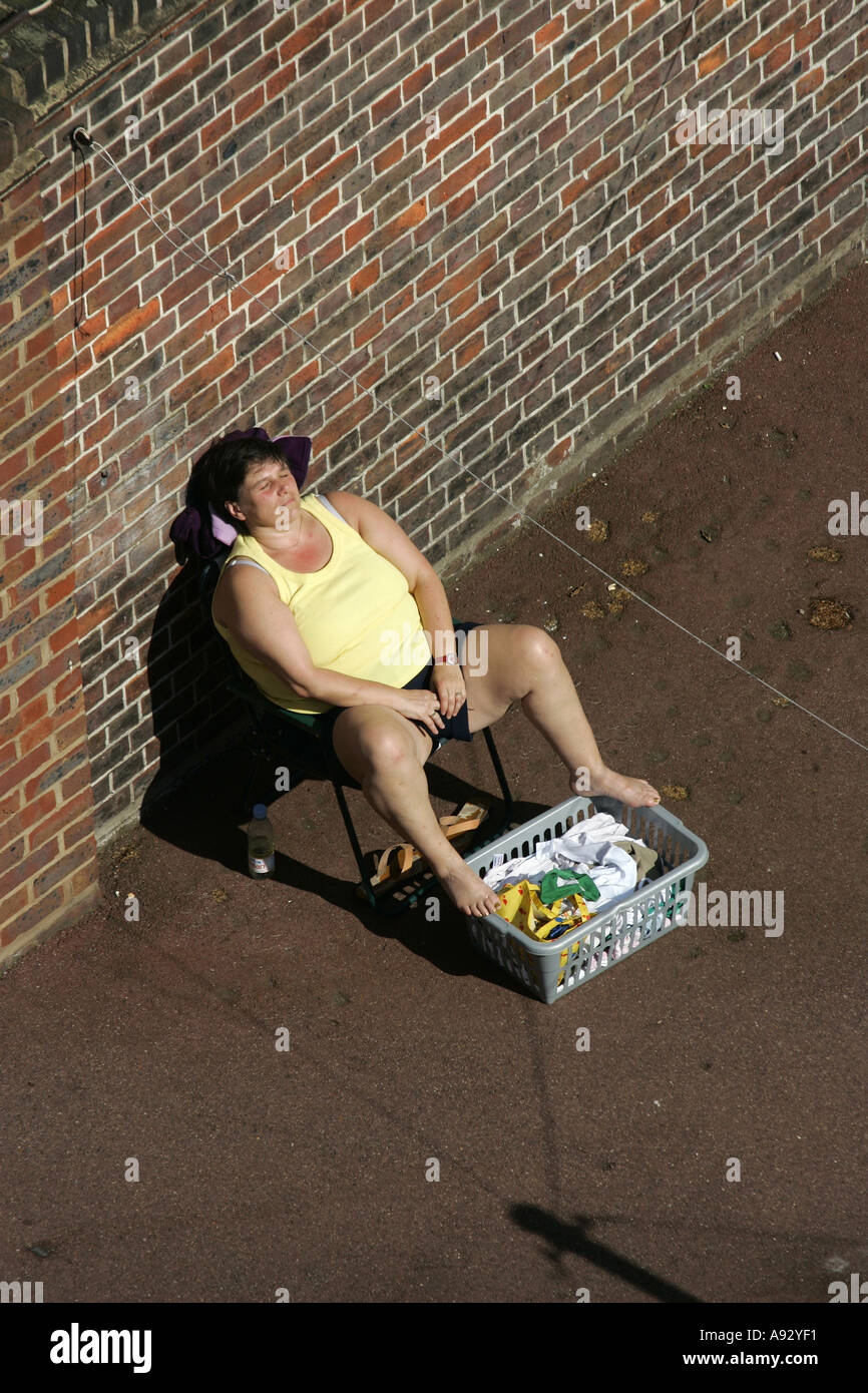 Uk council estate woman hi-res stock photography and images - Alamy