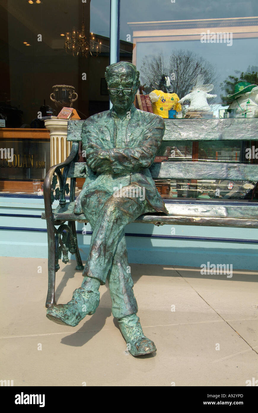 Statue of Poet on bench outside a book store at Downtown Disney ...