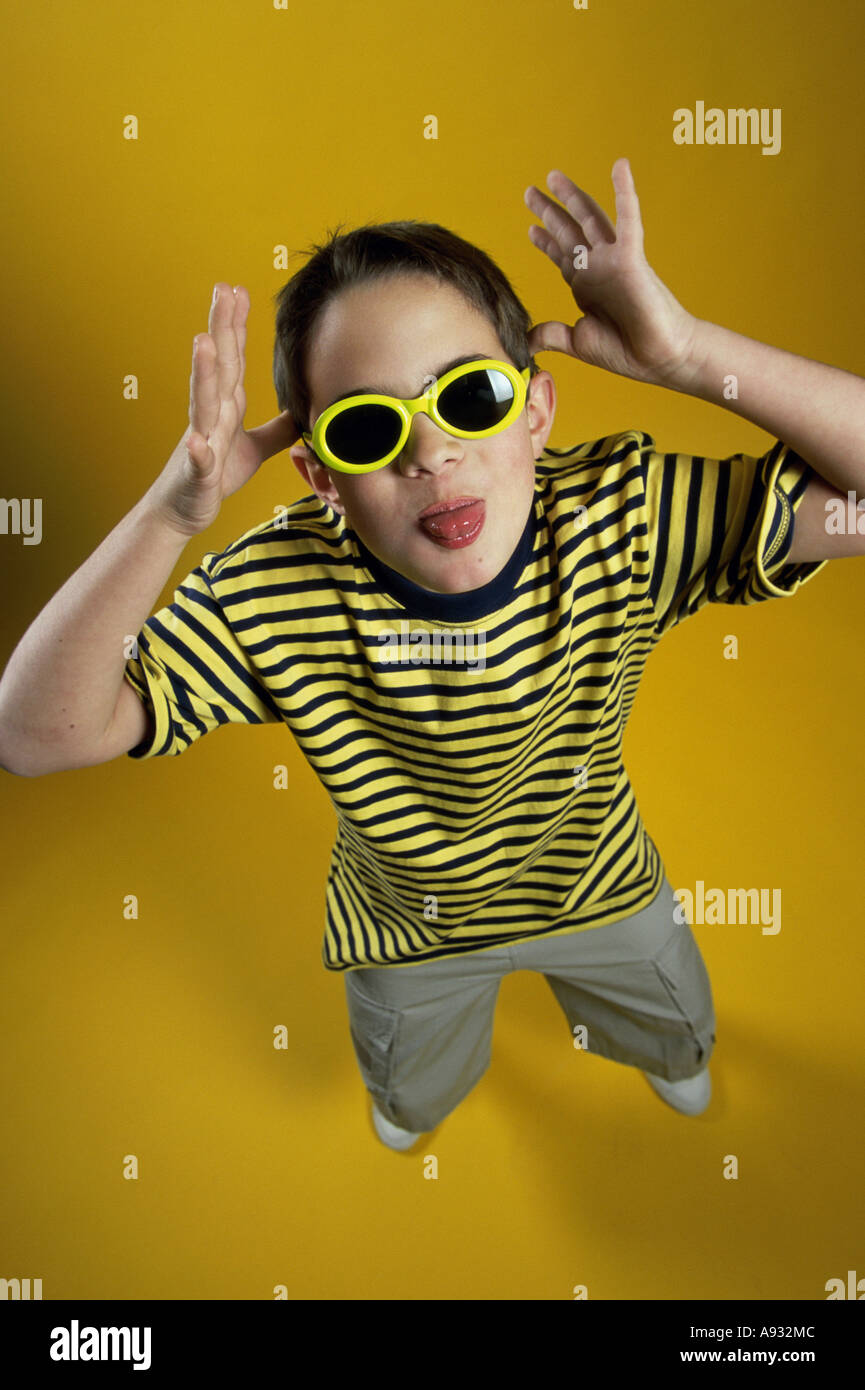 High angle view of a boy making a face Stock Photo - Alamy