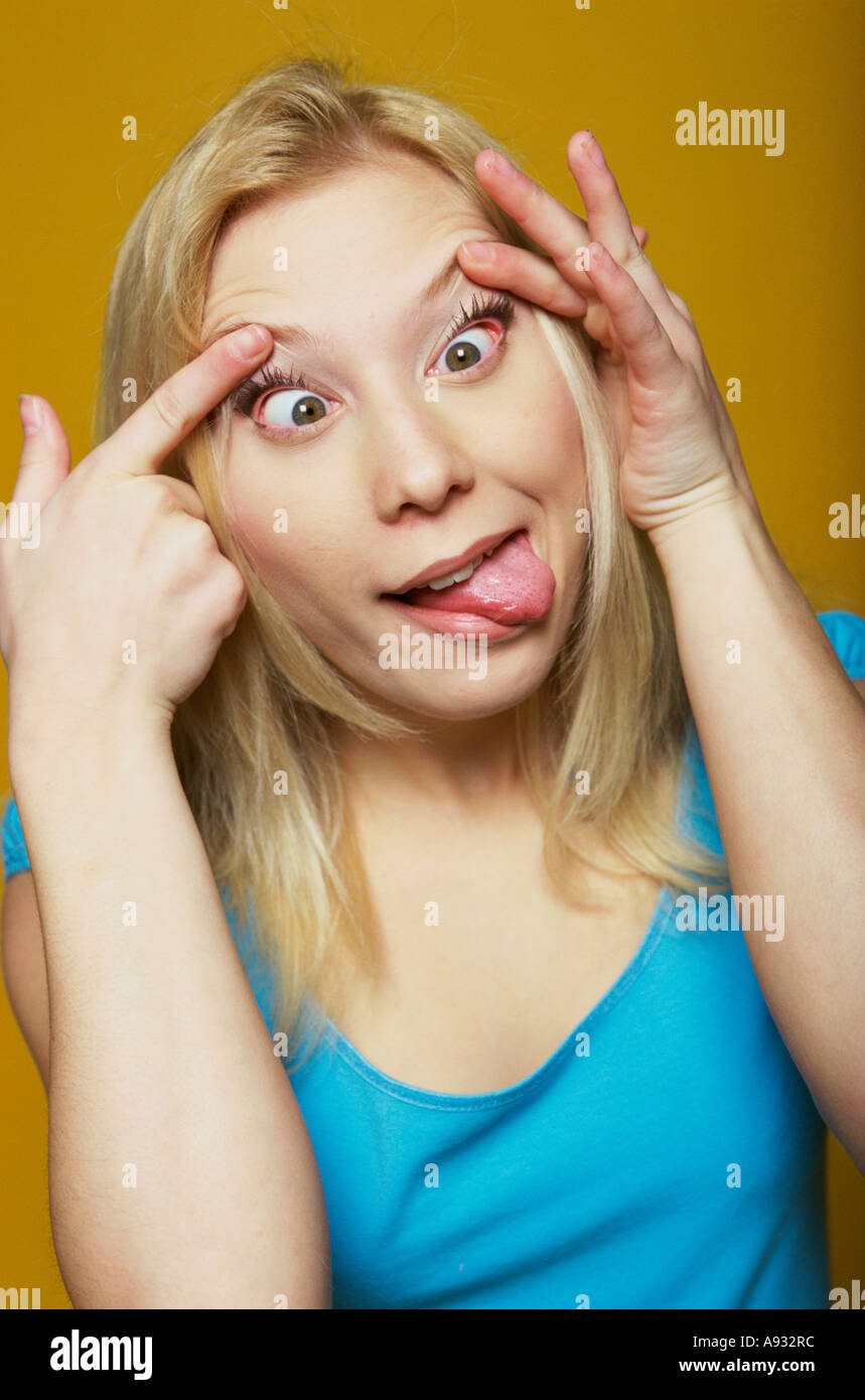 Close-up of a teenage girl making a face Stock Photo - Alamy