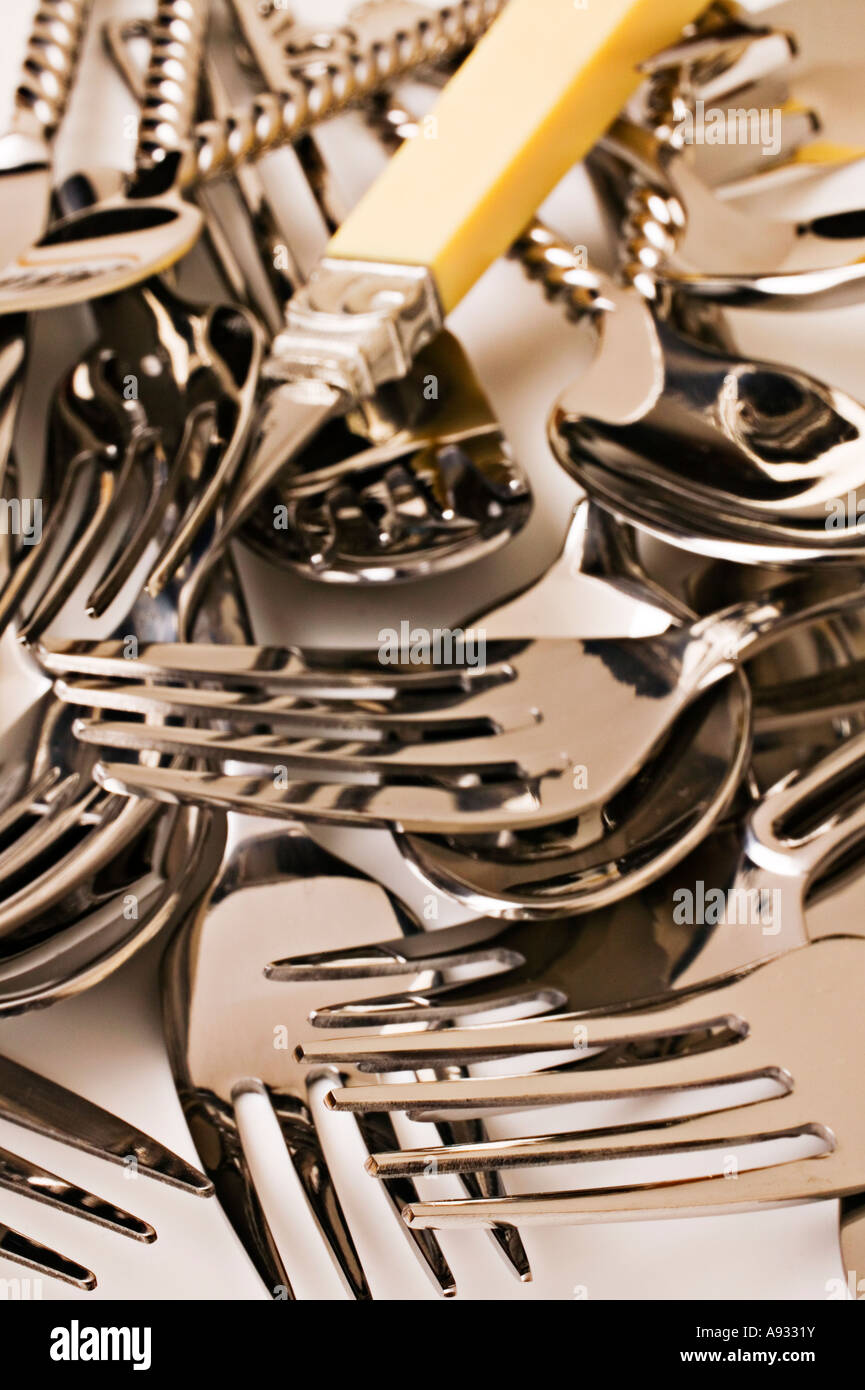 Pile of silverware Stock Photo - Alamy