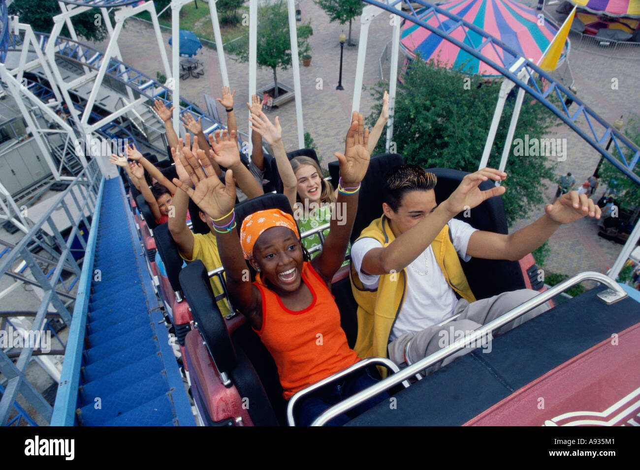 Group people on rollercoaster ride hi-res stock photography and images ...