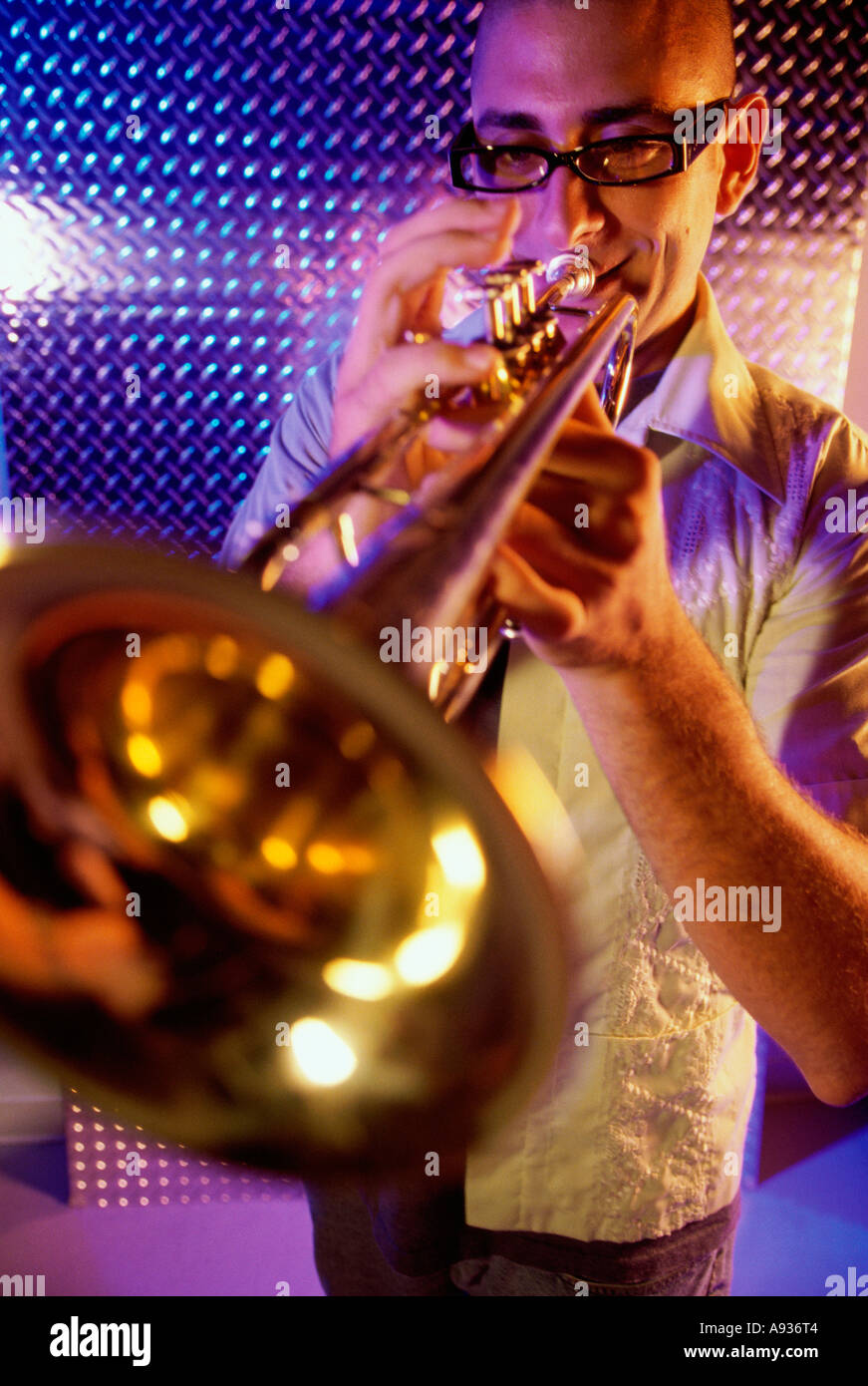 Man blowing into trumpet hi-res stock photography and images - Alamy