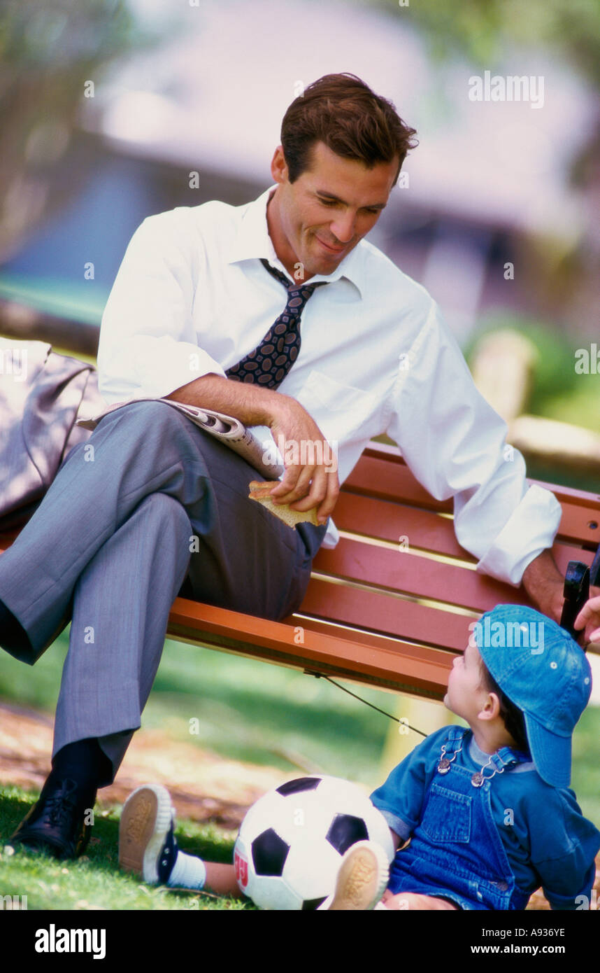 Father looking at his son Stock Photo - Alamy