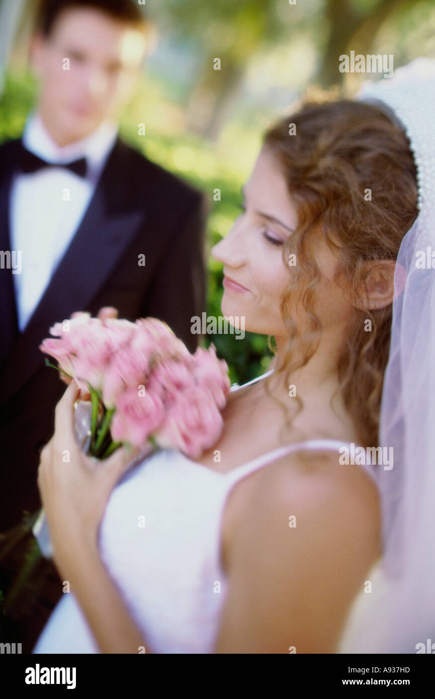 Side profile bride holding bouquet hi-res stock photography and images ...