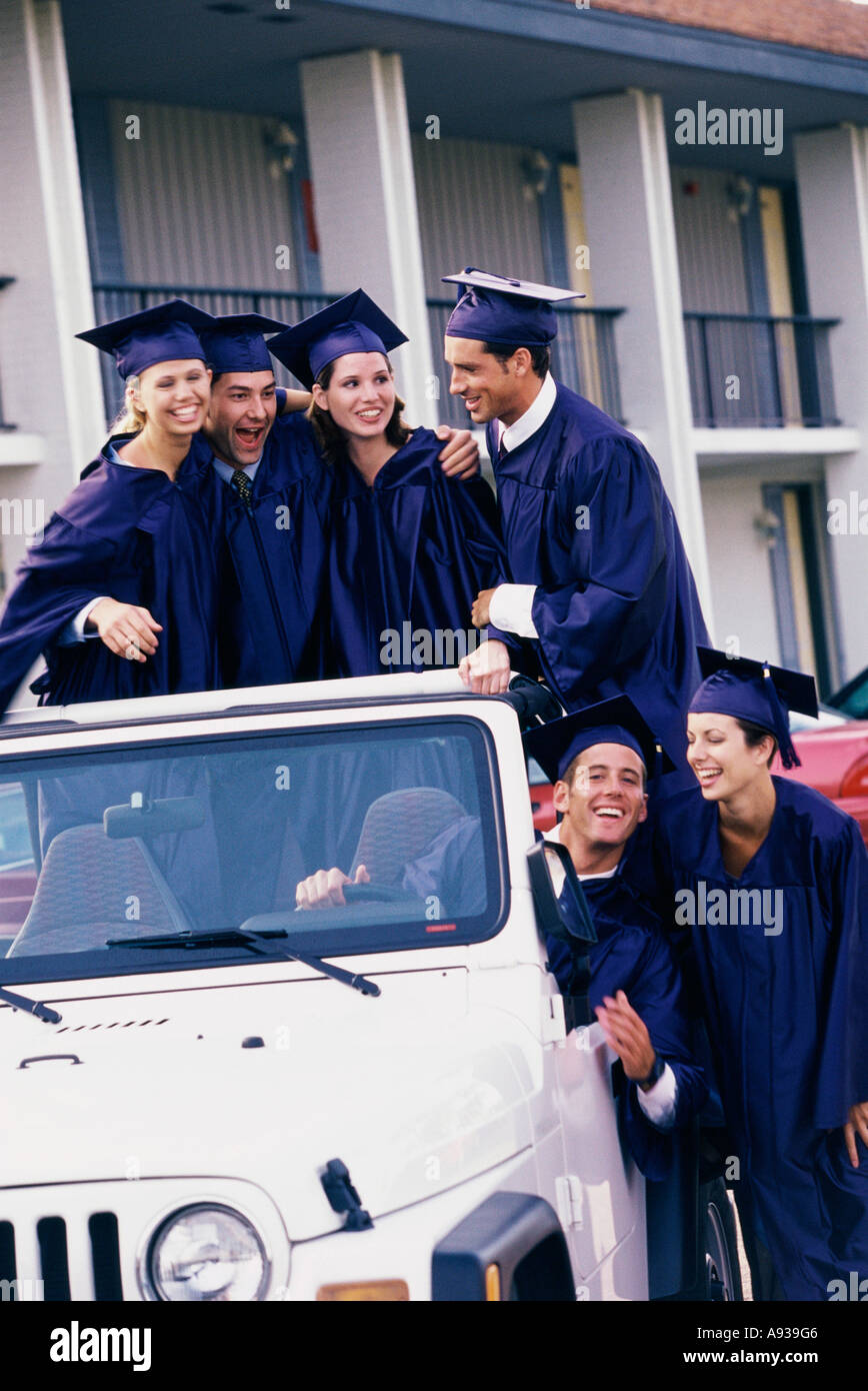 Group of college students celebrating their graduation Stock Photo - Alamy