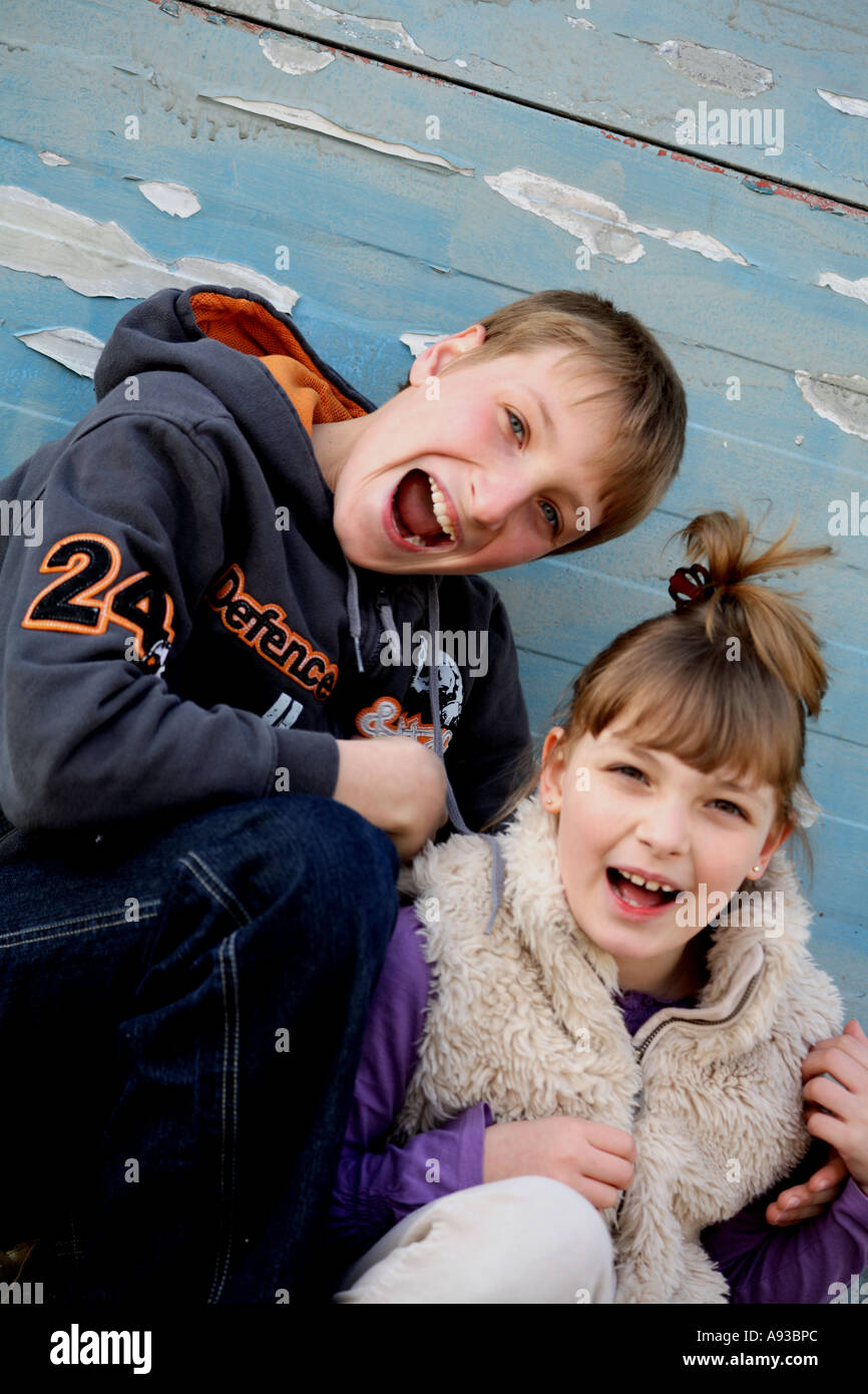 Girl making funny faces at boy hi-res stock photography and images - Alamy