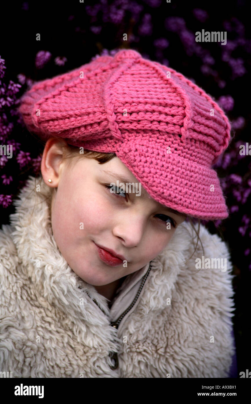 Vertical close up portrait of pretty, cheeky young girl with attitude ...