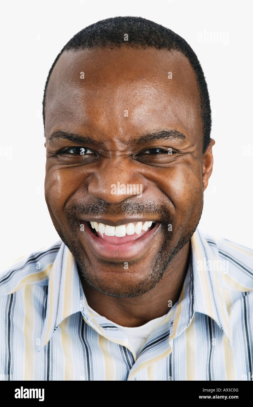 Close up of African man laughing Stock Photo - Alamy