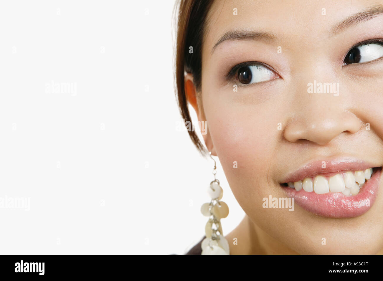 Shy woman biting lip hi-res stock photography and images - Alamy