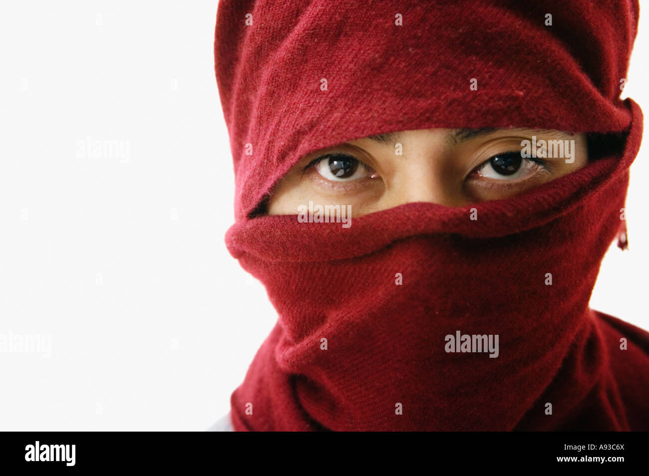 Pacific Islander man with scarf covering head and face Stock Photo - Alamy