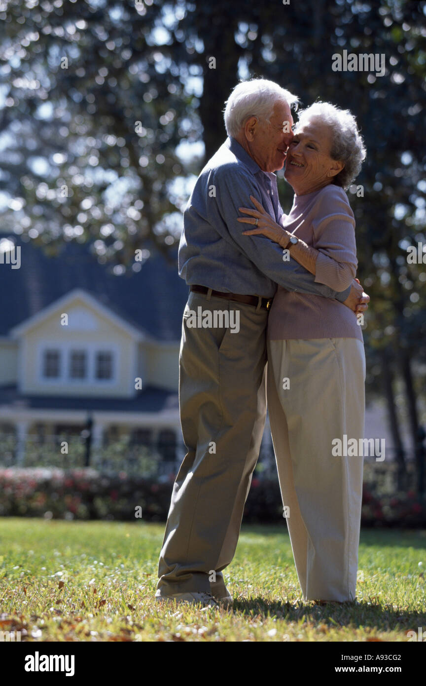 Side profile of a senior couple embracing Stock Photo - Alamy