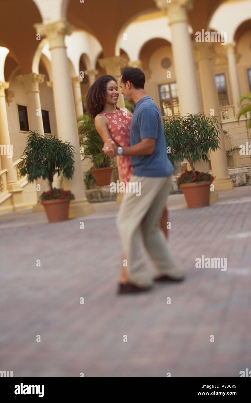 Side profile of a young couple dancing Stock Photo - Alamy