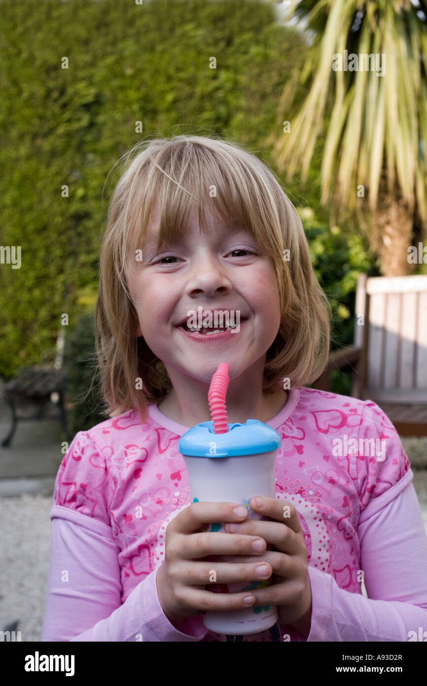 happy kid drinking Stock Photo - Alamy