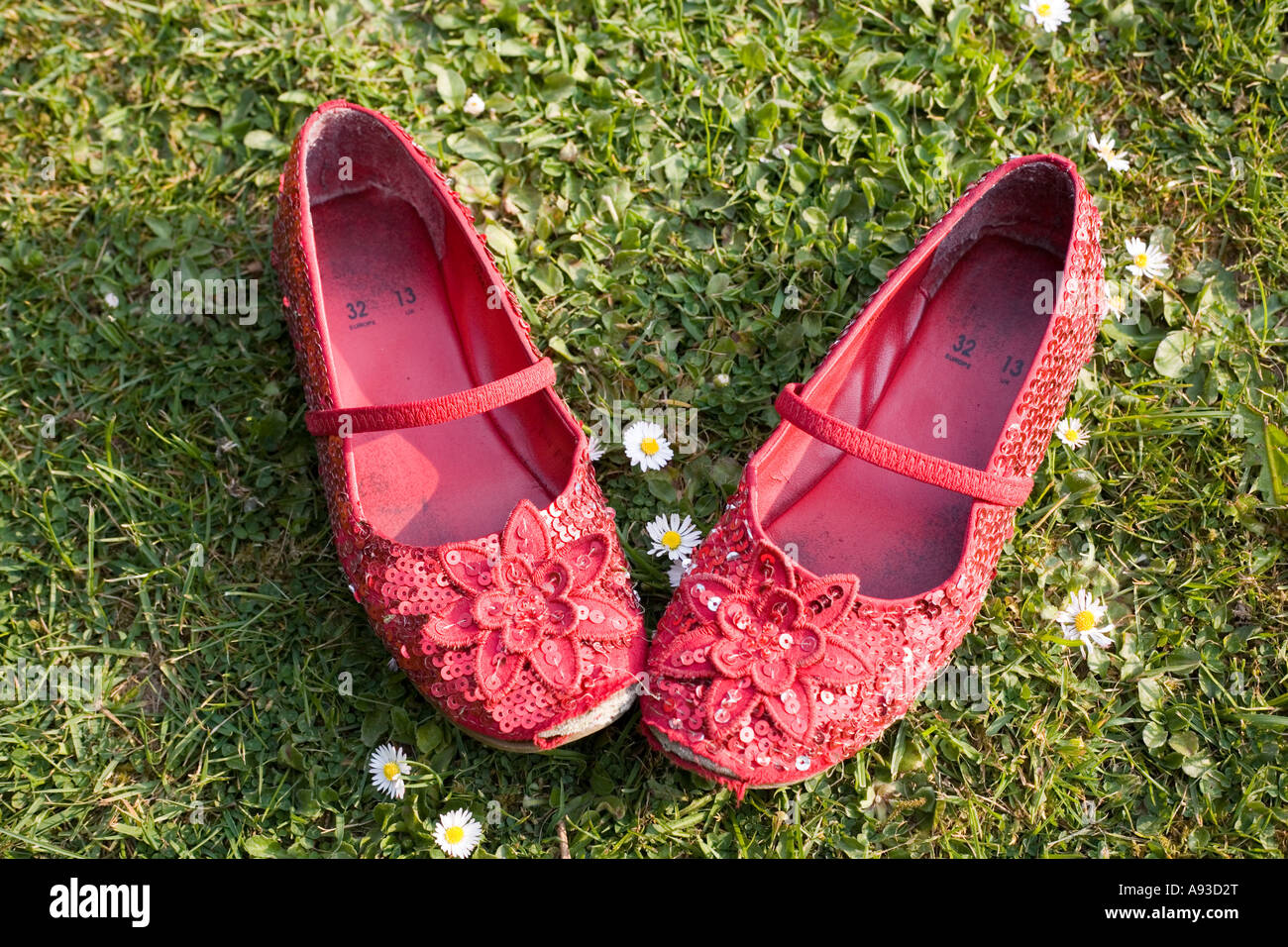 old pretty kids red shoes Stock Photo - Alamy