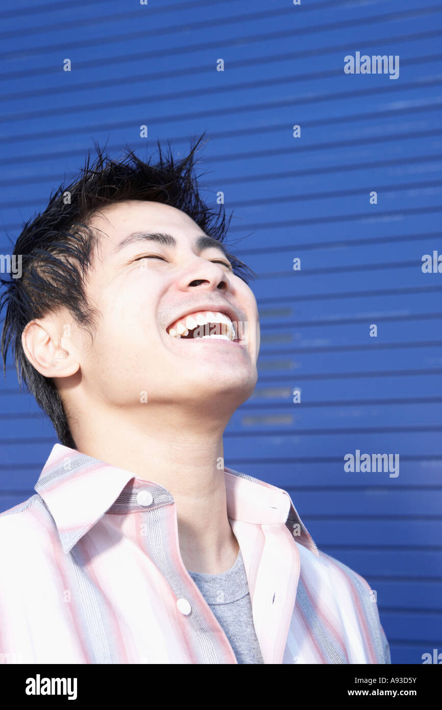Close up of Pacific Islander man laughing Stock Photo - Alamy