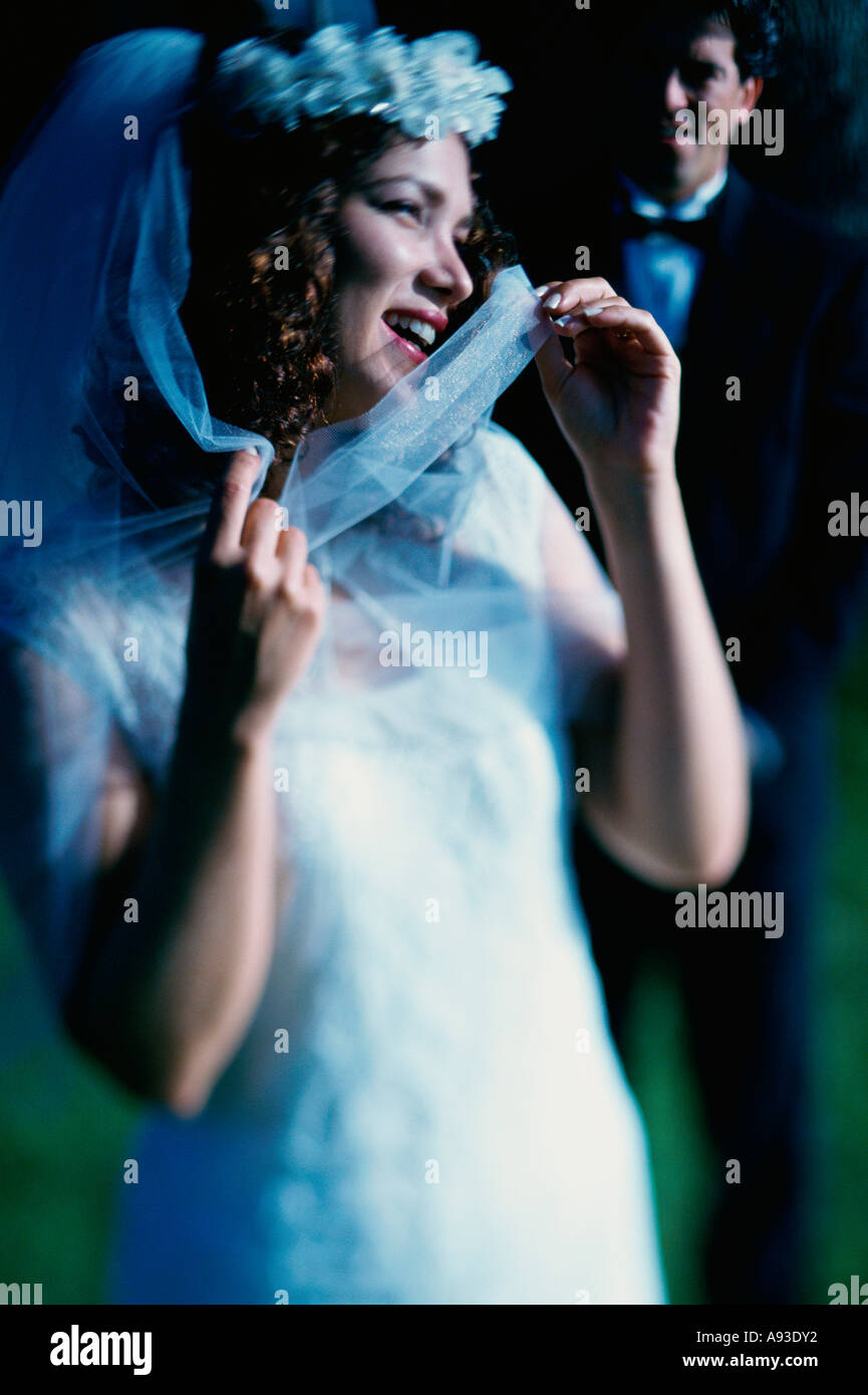 Bride wearing up hi-res stock photography and images - Alamy