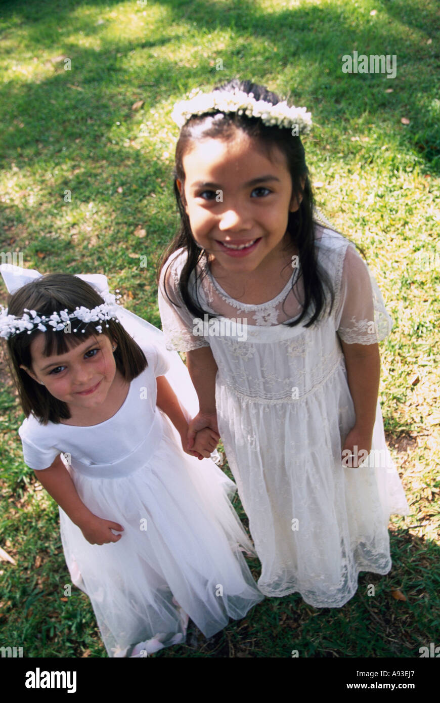 Two flower girls stand hi-res stock photography and images - Alamy