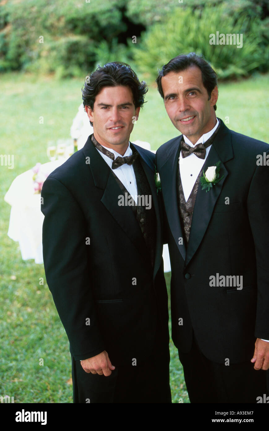 Portrait of two young men standing together Stock Photo - Alamy