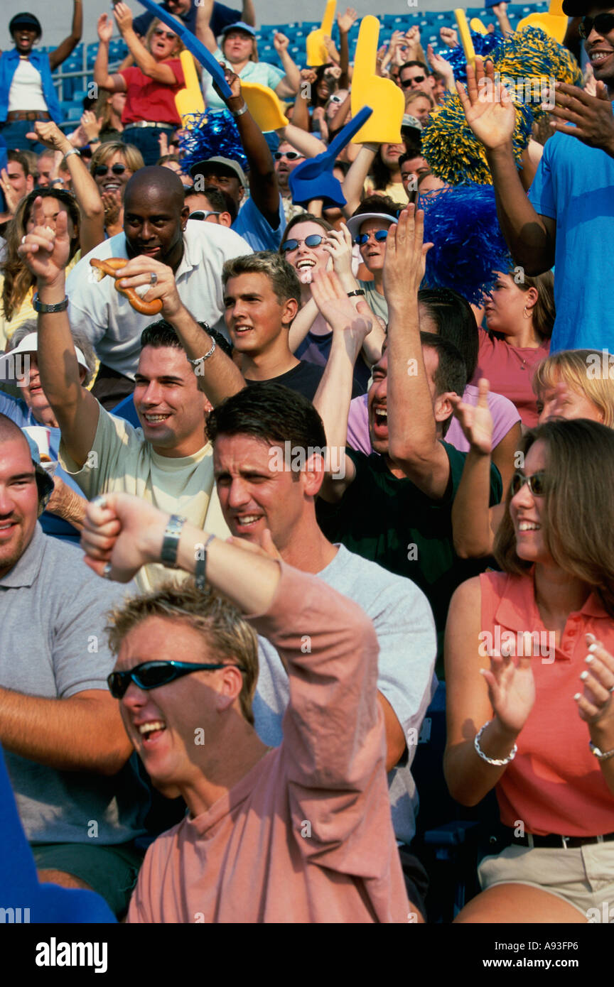 Group of spectators cheering in a stadium Stock Photo - Alamy