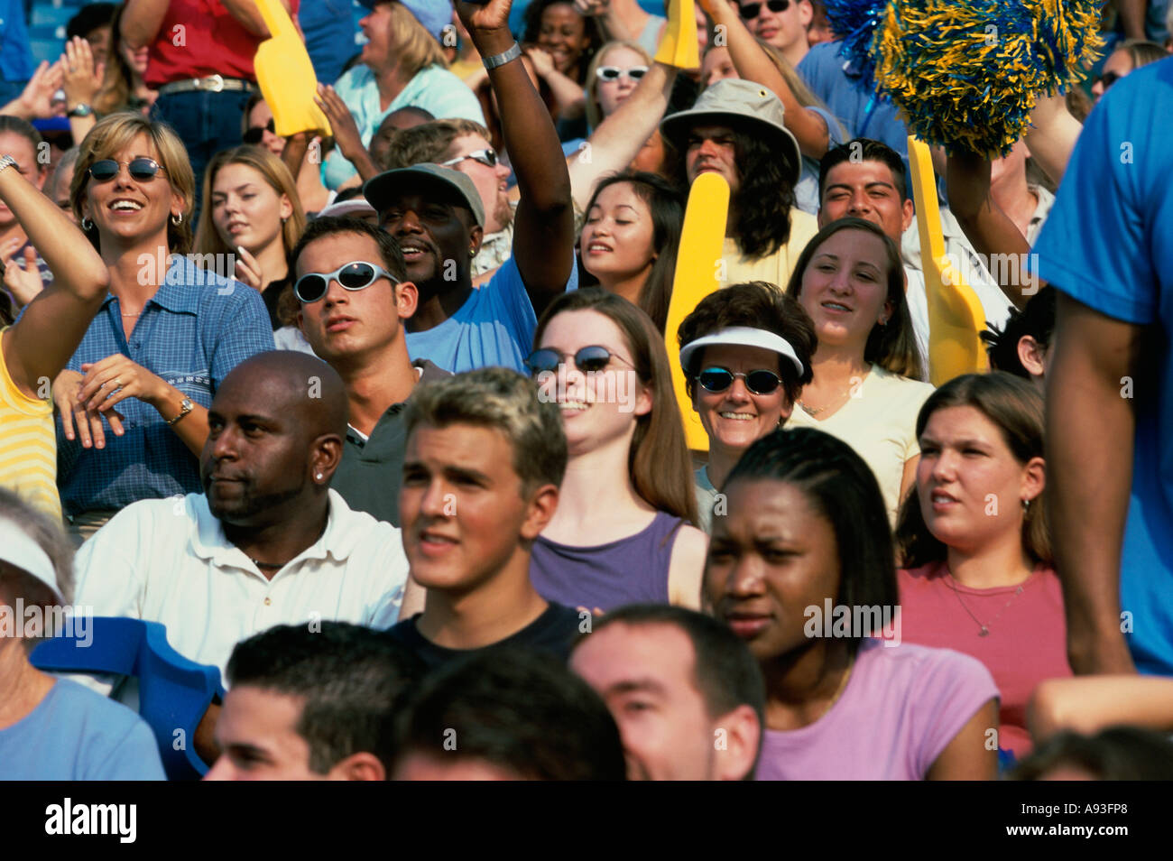 Group of spectators cheering in a stadium Stock Photo - Alamy