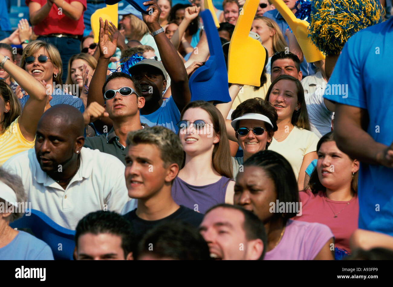 Group of spectators cheering in a stadium Stock Photo - Alamy
