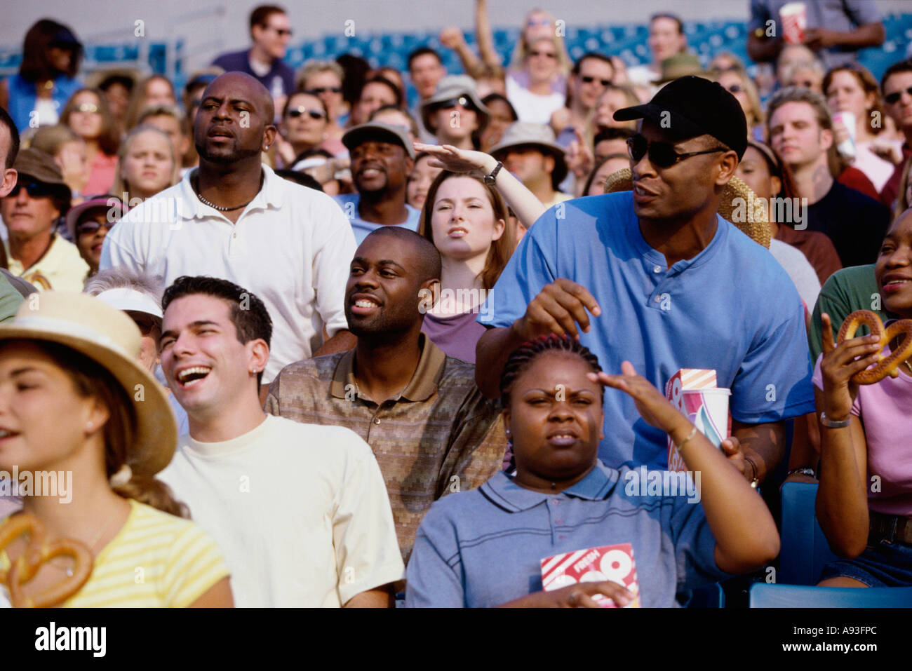 Spectators in a stadium Stock Photo - Alamy