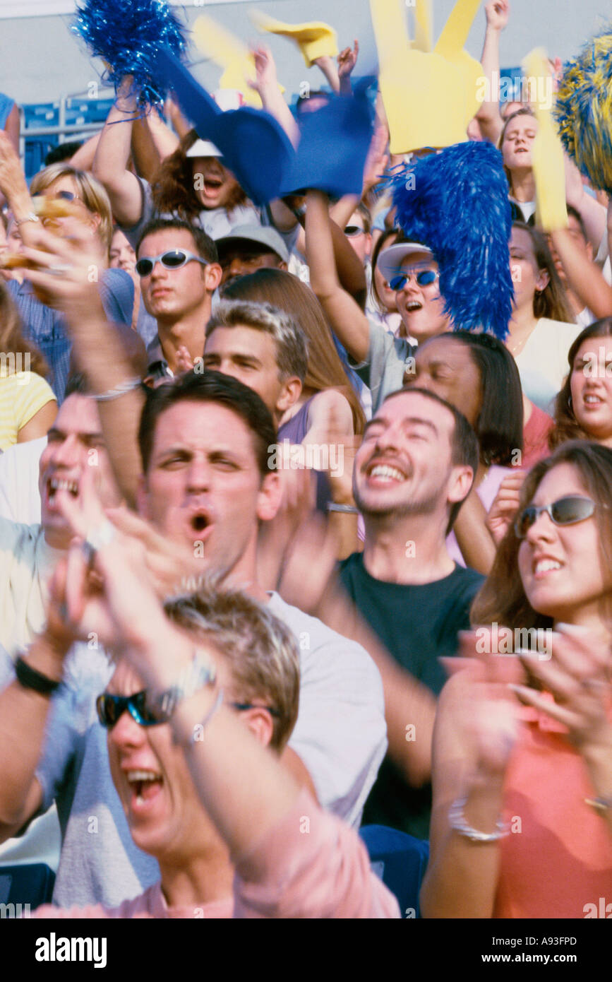 Group of spectators cheering in a stadium Stock Photo - Alamy