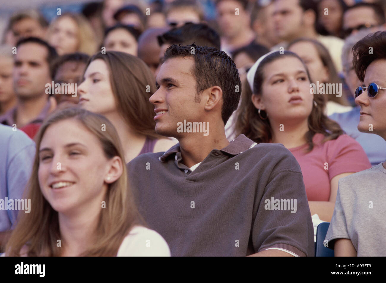 Spectators sitting in a stadium Stock Photo - Alamy