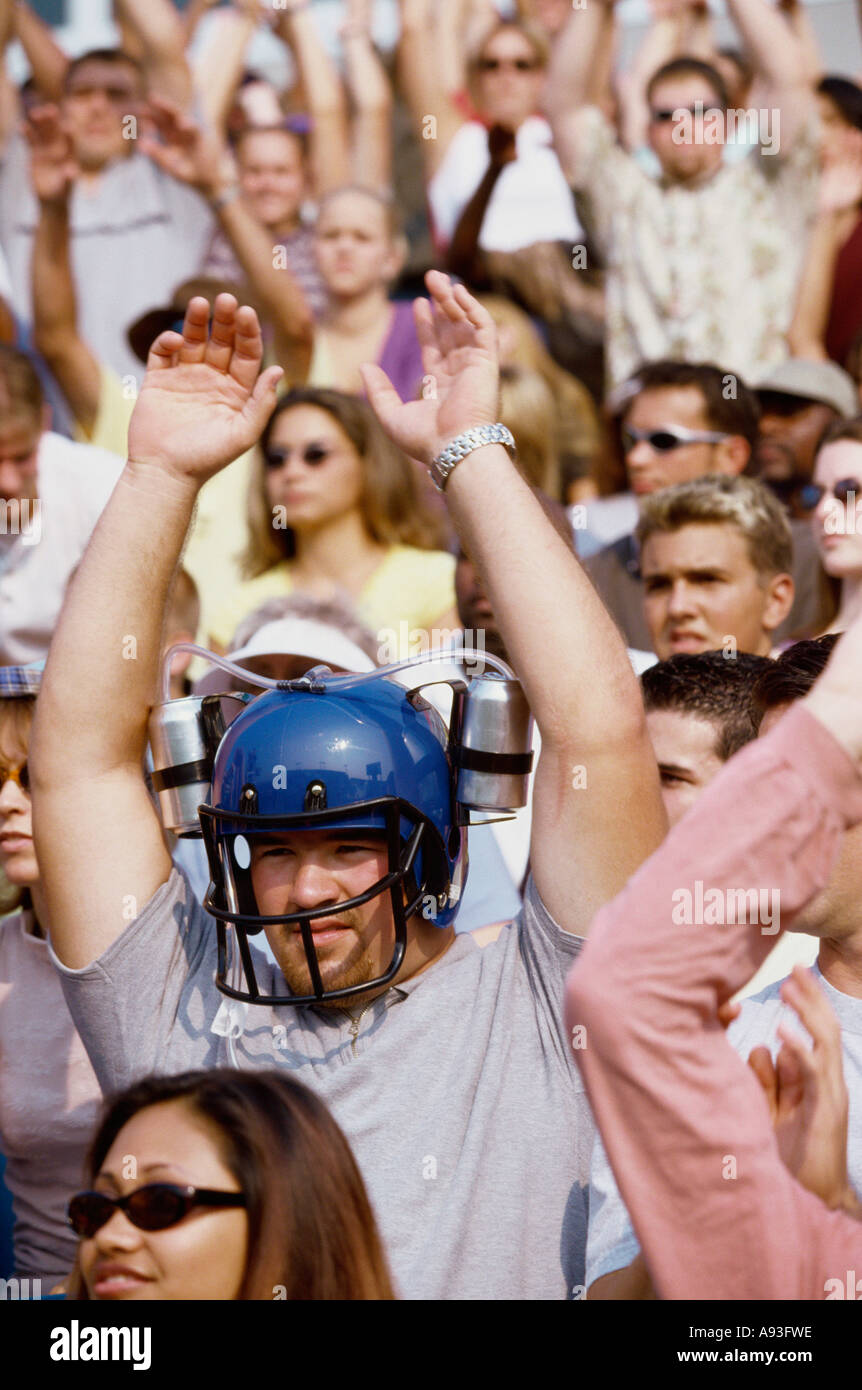 Group of spectators applauding in a stadium Stock Photo - Alamy