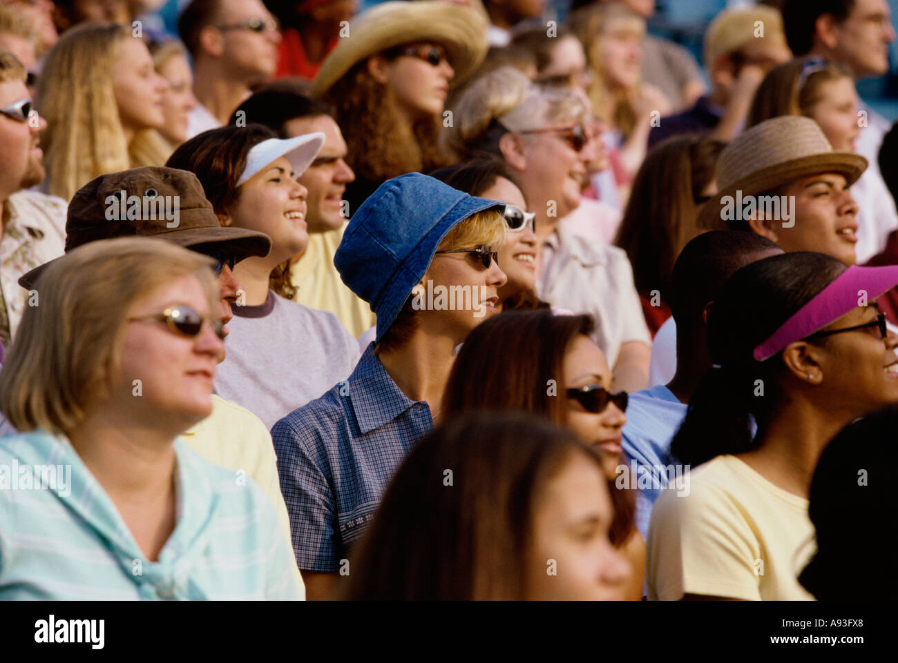 Group of spectators sitting in a stadium Stock Photo - Alamy