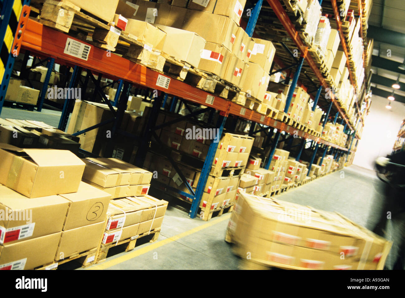 Packages in warehouse Stock Photo - Alamy