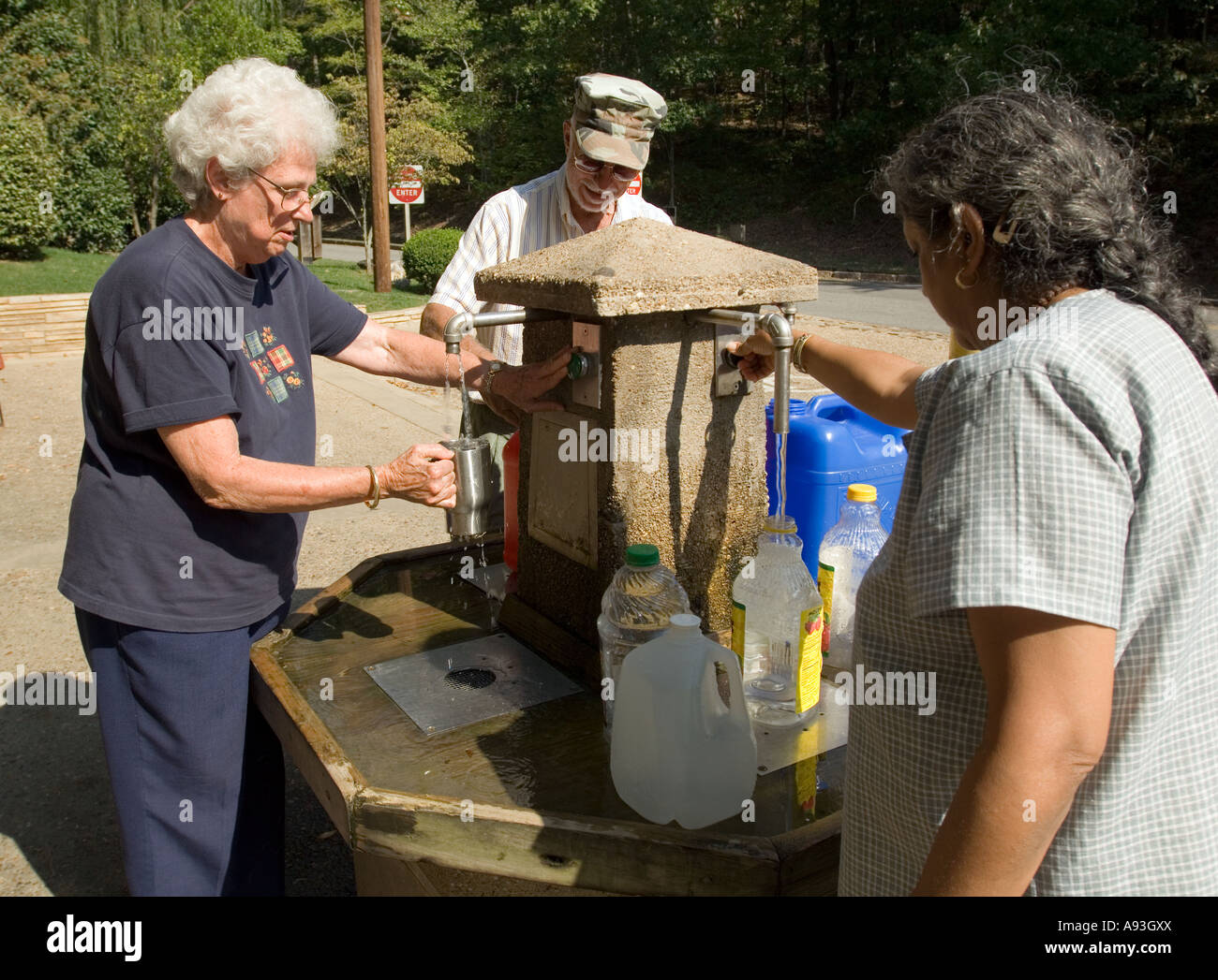 People filling jugs with the famous Hot Springs mineral water which is ...