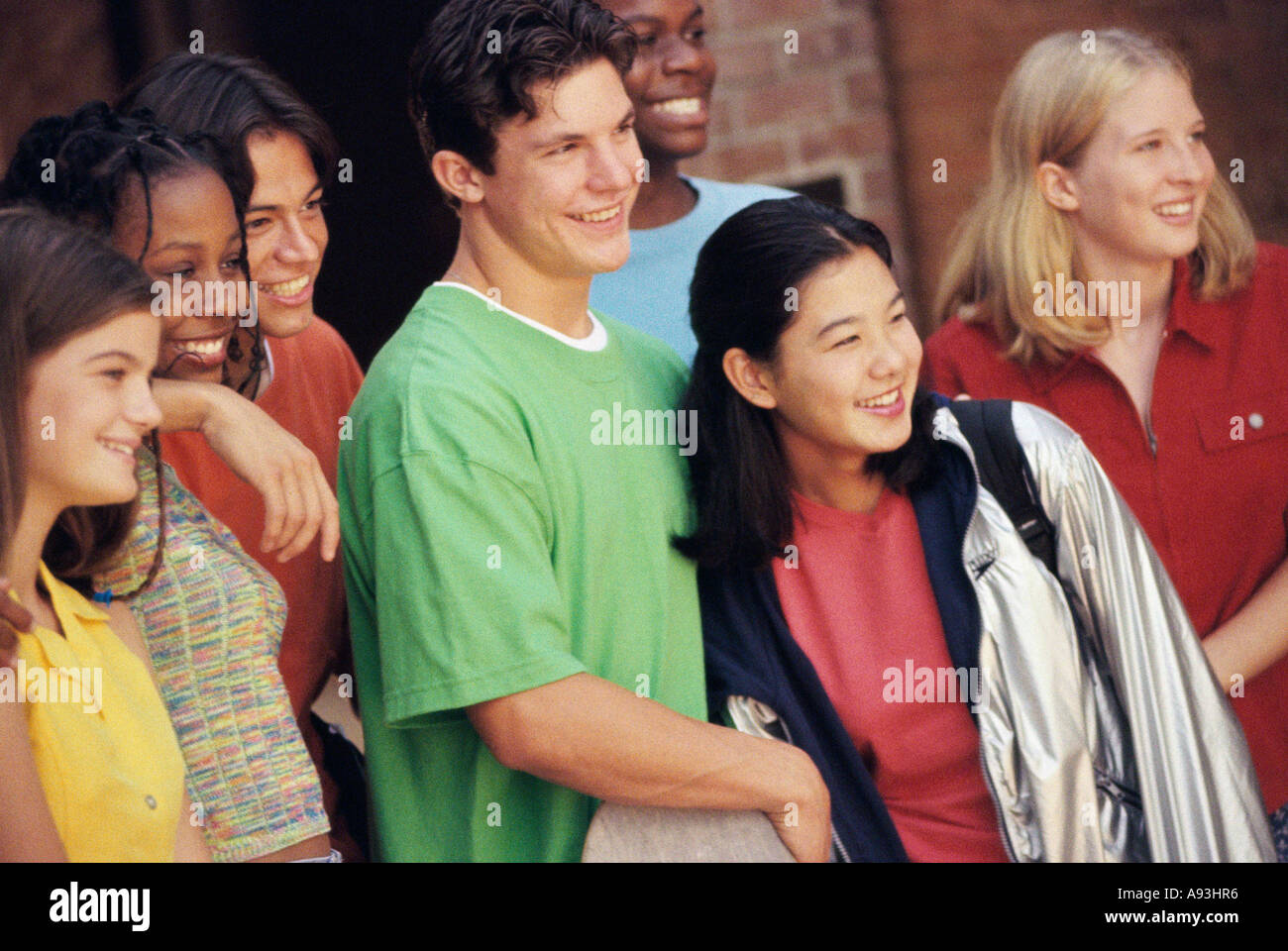 Side profile of a group of teenagers smiling Stock Photo - Alamy