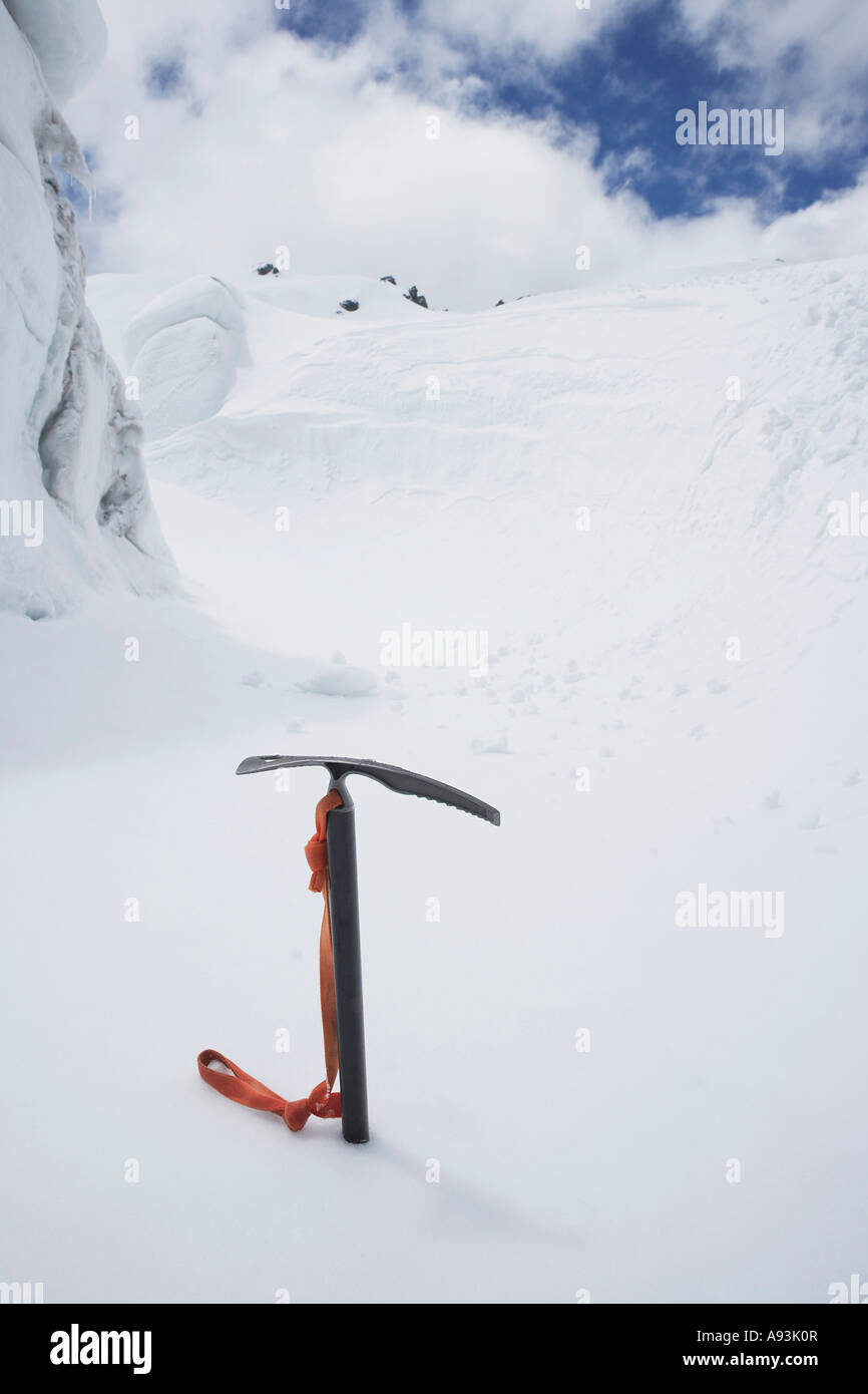Mountain climbing pick axe in the snow Stock Photo - Alamy