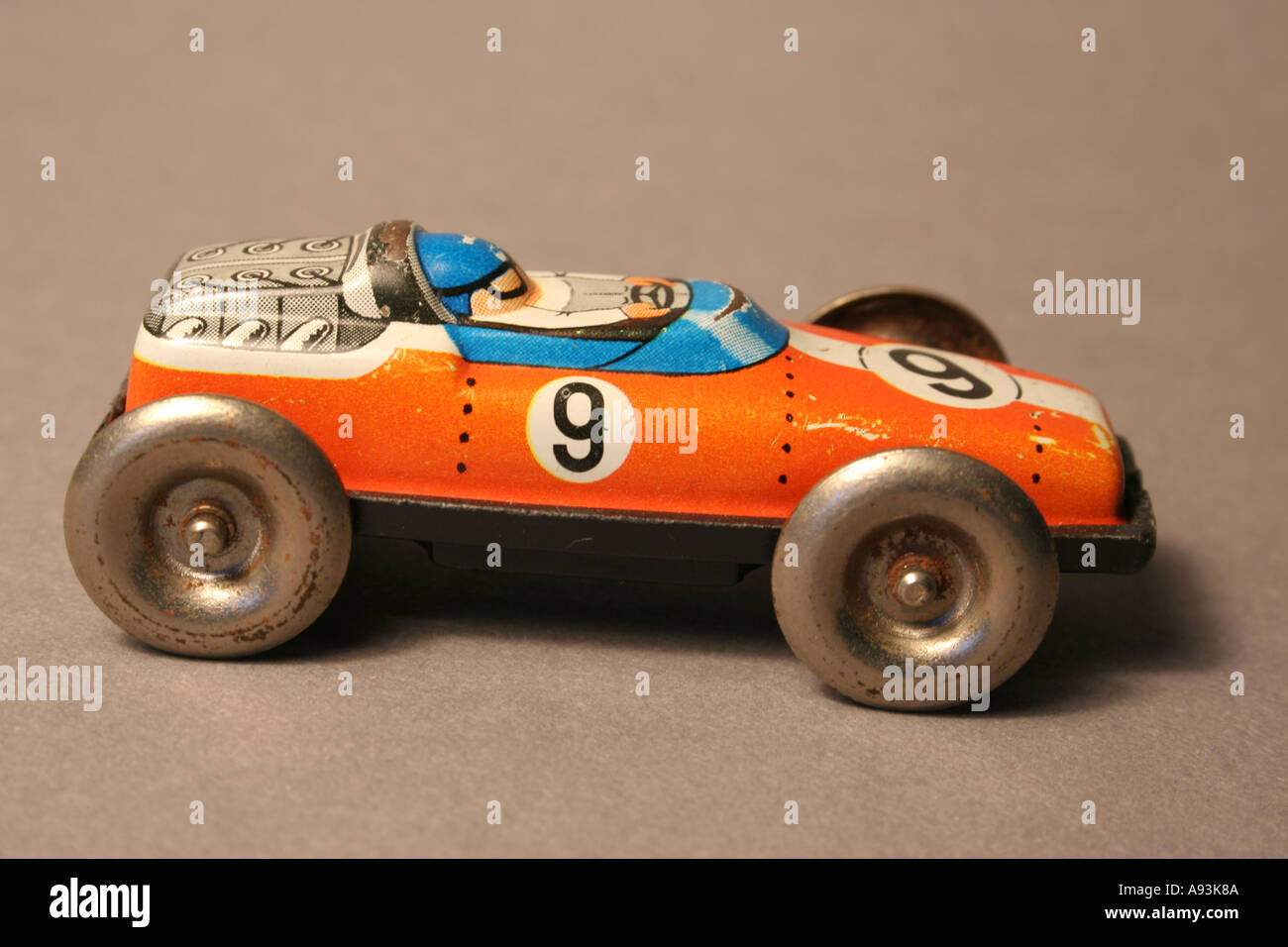 model of old toy racing car with number 9 on bodywork Stock Photo - Alamy