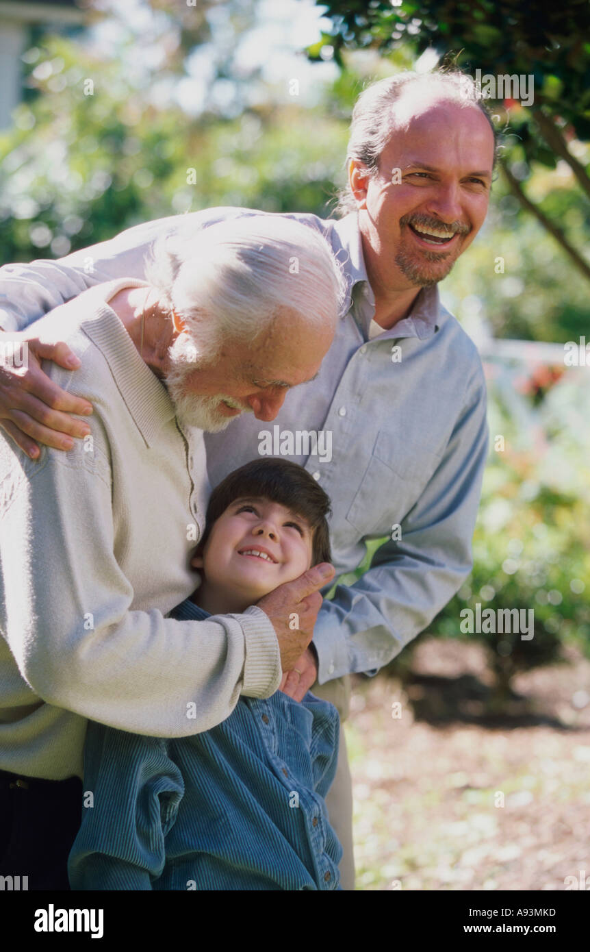 Grandfather hugging his granddaughter Stock Photo - Alamy
