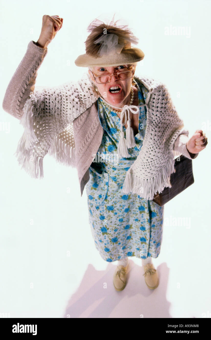 High angle view of a senior woman shouting in anger Stock Photo - Alamy