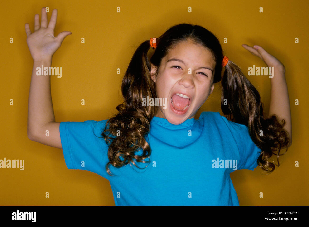 Portrait of a girl screaming Stock Photo - Alamy