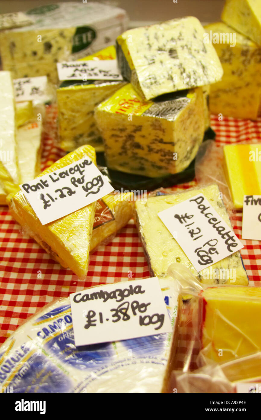 Various cheese from around the world in shop window UK Stock Photo - Alamy