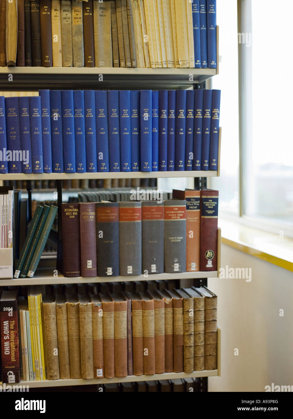 Books on library shelf Stock Photo - Alamy