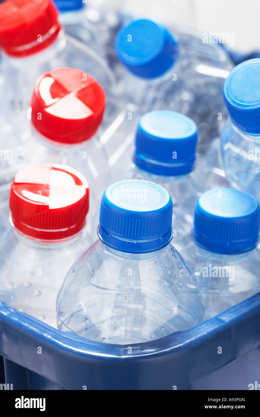 Empty plastic bottles in container, close-up Stock Photo - Alamy