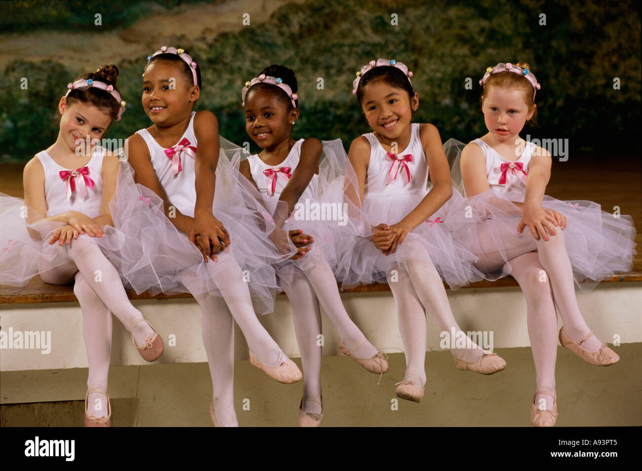Group of ballet dancers sitting together Stock Photo - Alamy