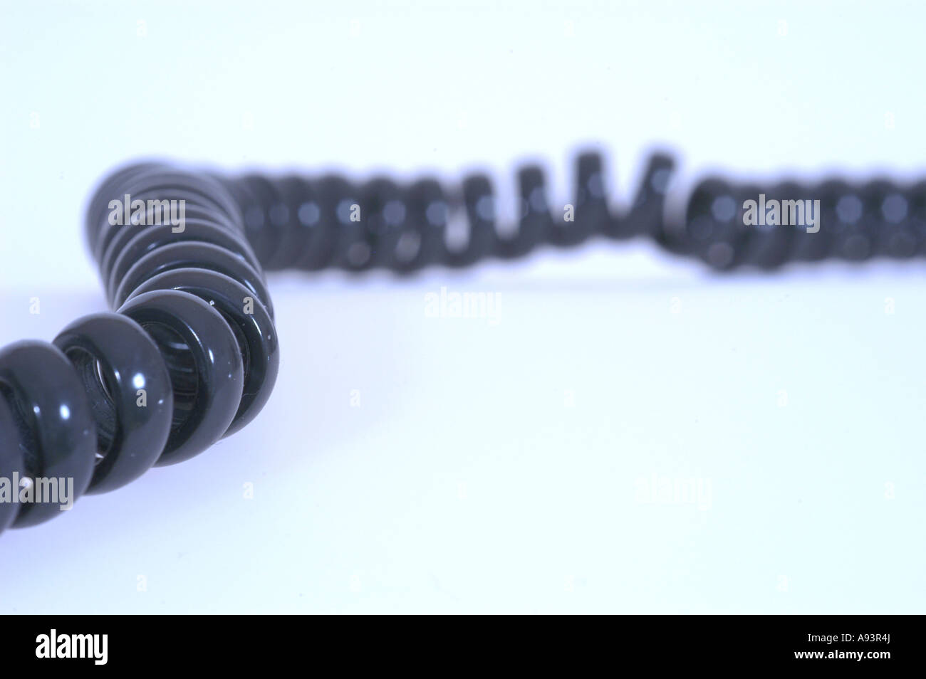 Telephone spirale cable Stock Photo - Alamy
