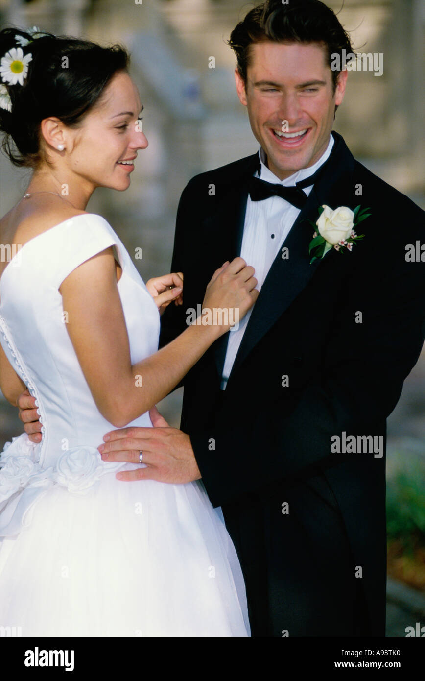 Side profile of a newlywed couple smiling Stock Photo - Alamy