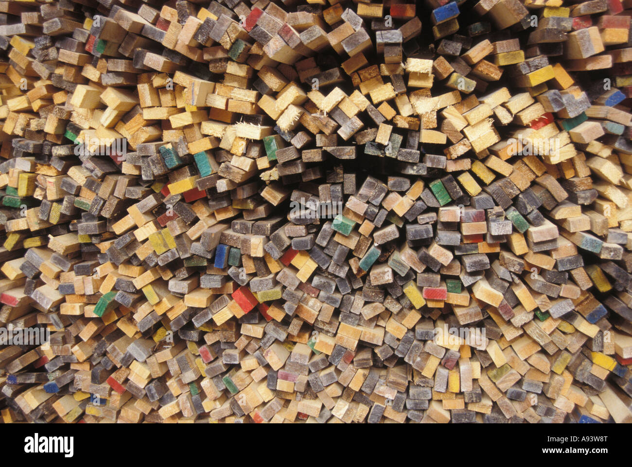 pile of wood with coloured marks Stock Photo - Alamy