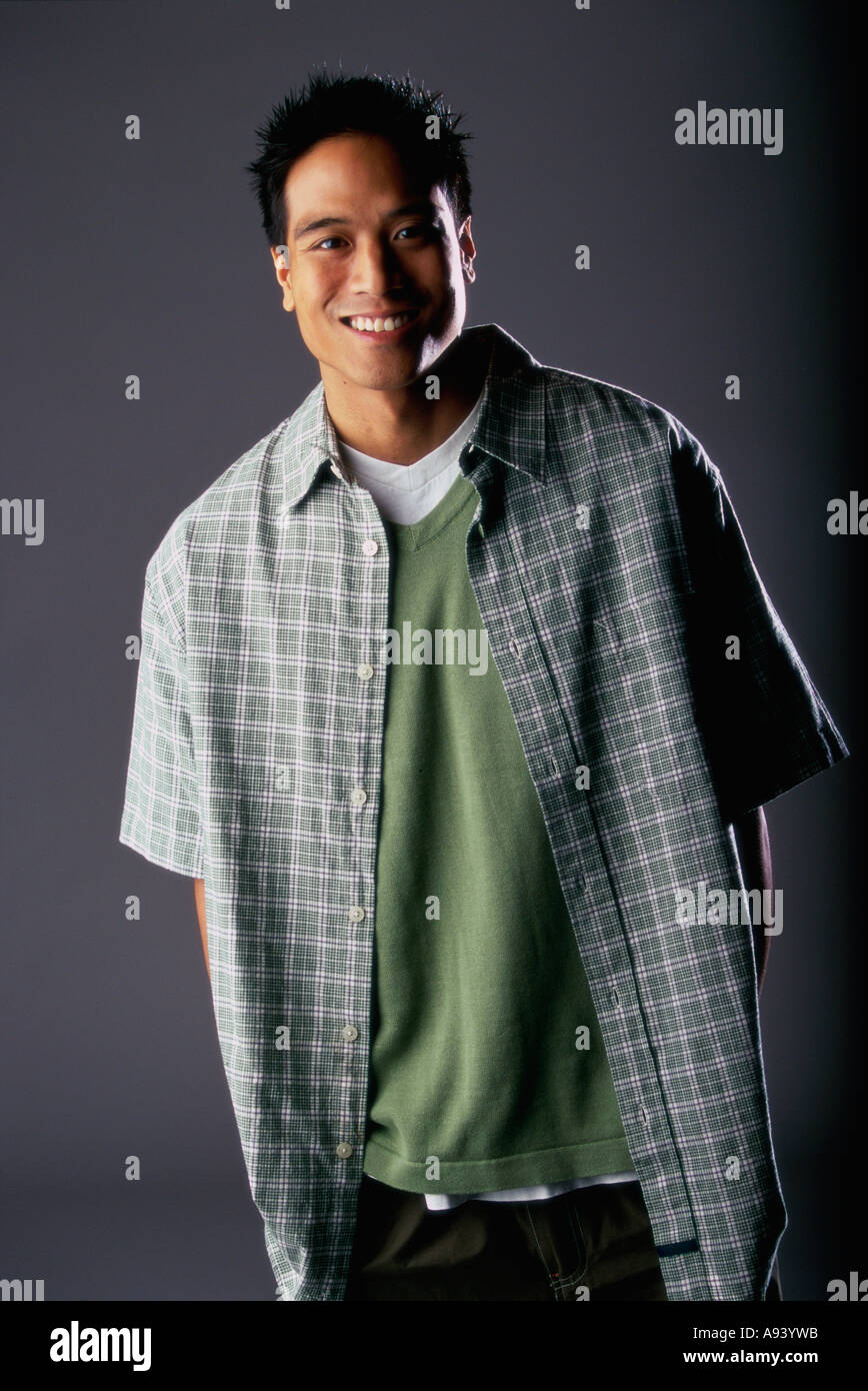 Portrait of a teenage boy smiling Stock Photo - Alamy