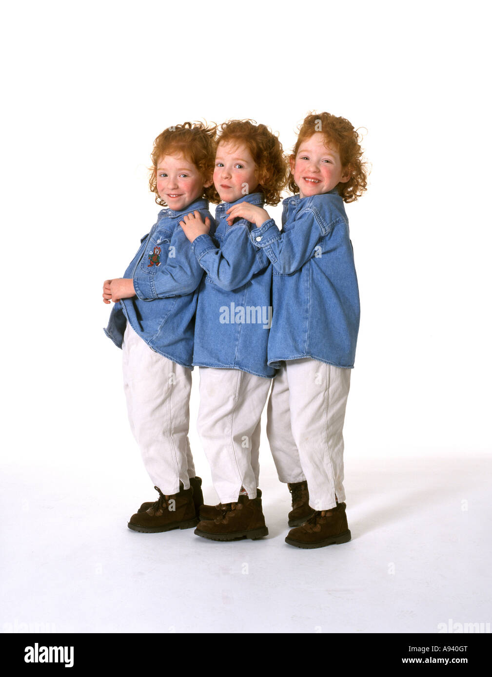 Triplet with red hair Stock Photo - Alamy