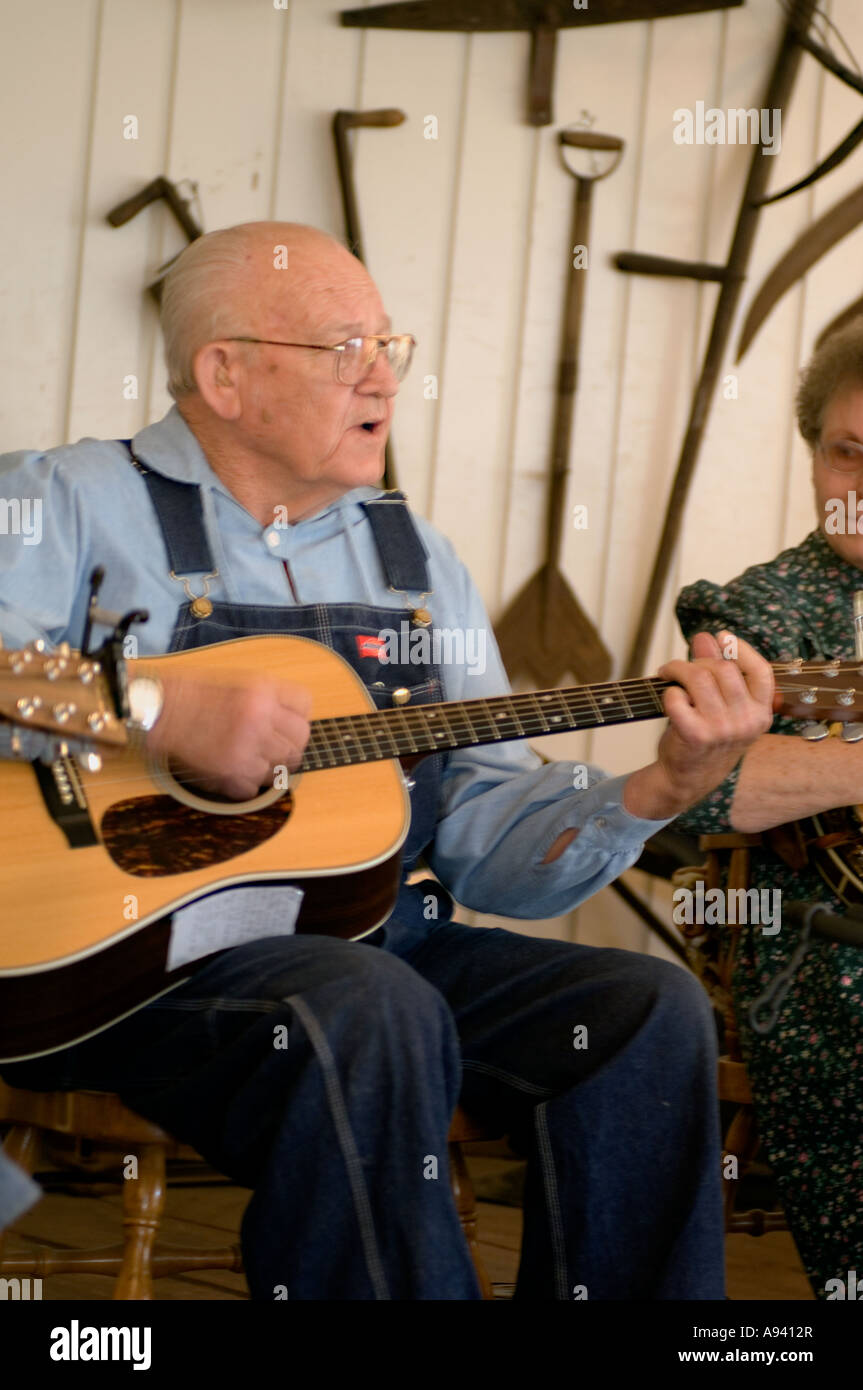 Folk musician performing at a concert at the Ozark Folk Center State ...